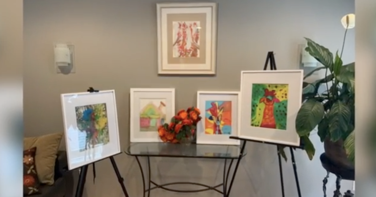 Teen with Down syndrome sells colorful artwork, advocates