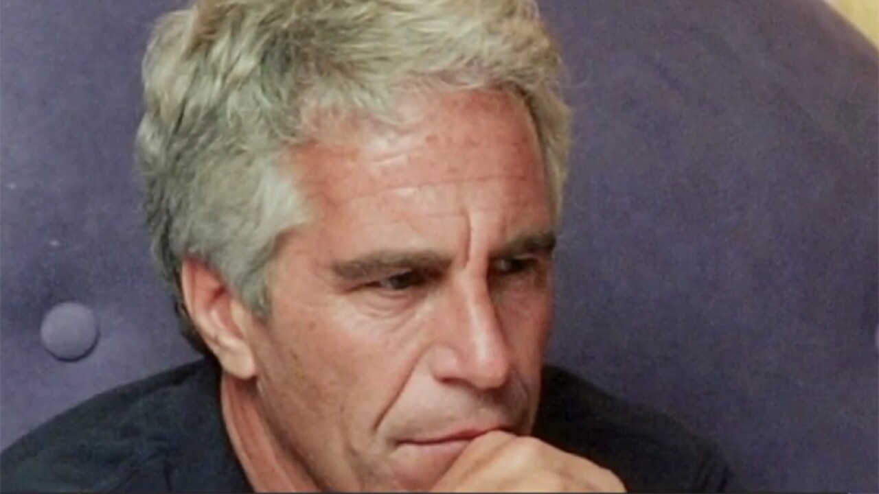Woman sues Epstein estate, says she was 14 during encounter