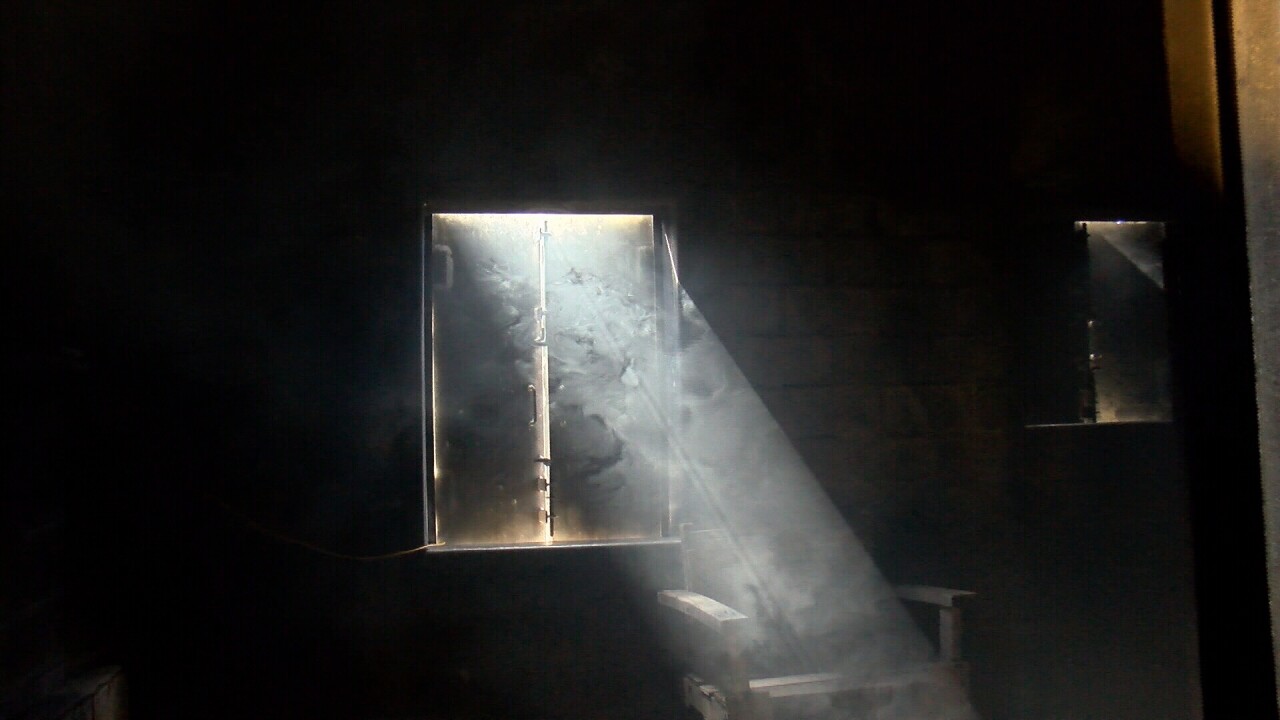 City firefighters demonstrate smoke-filled room escape