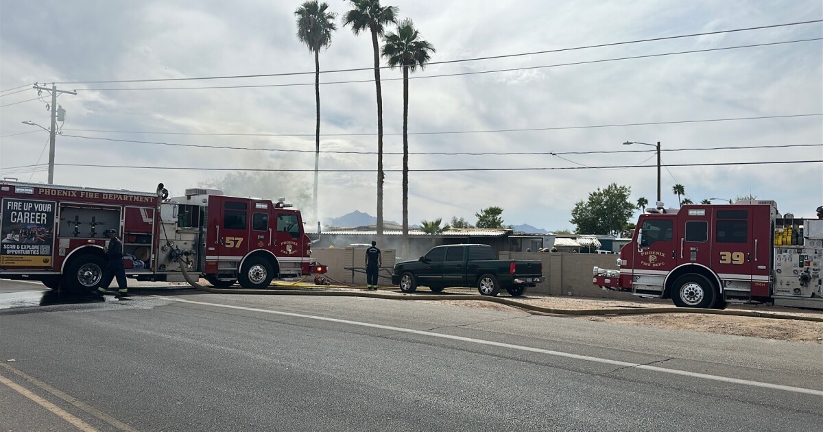 Five people displaced, Phoenix firefighter hurt after mobile home fire