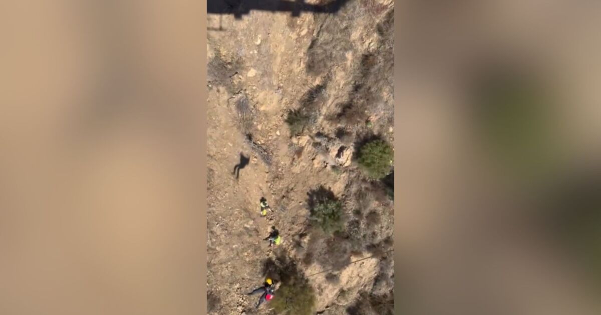 WATCH: Biker rescued after falling 150 feet over side of mountain in ...