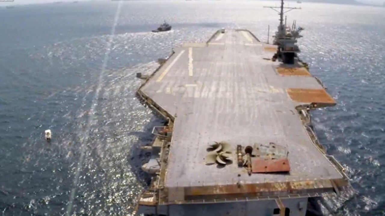 Drone films the USS Ranger on her final journey to the scrapyard