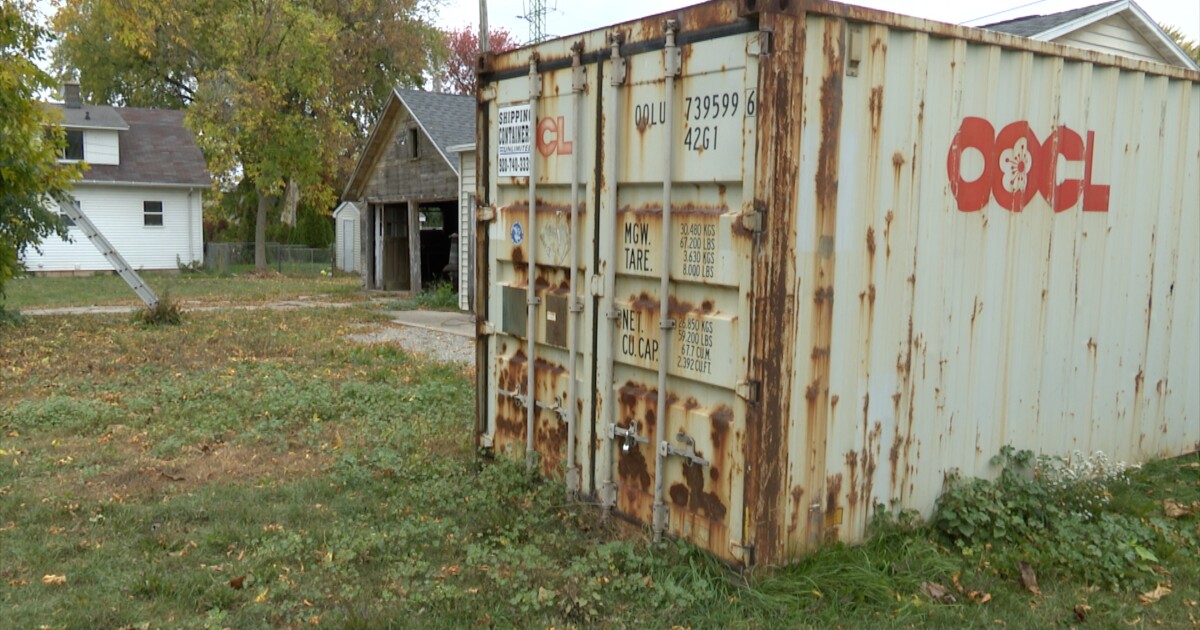 Rusty shipping container creates tension between neighbors in Menasha