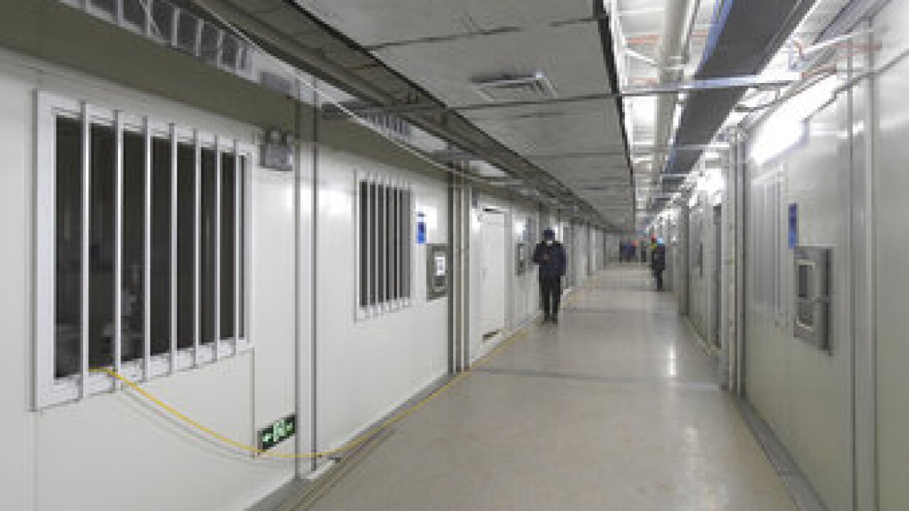 Built in 10 days, China's virus hospital takes 1st patients