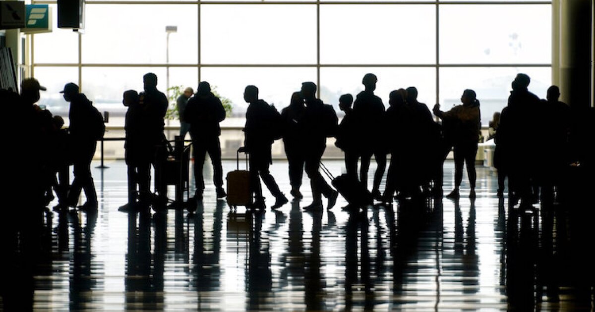 With virus surge, US to keep travel restrictions for now