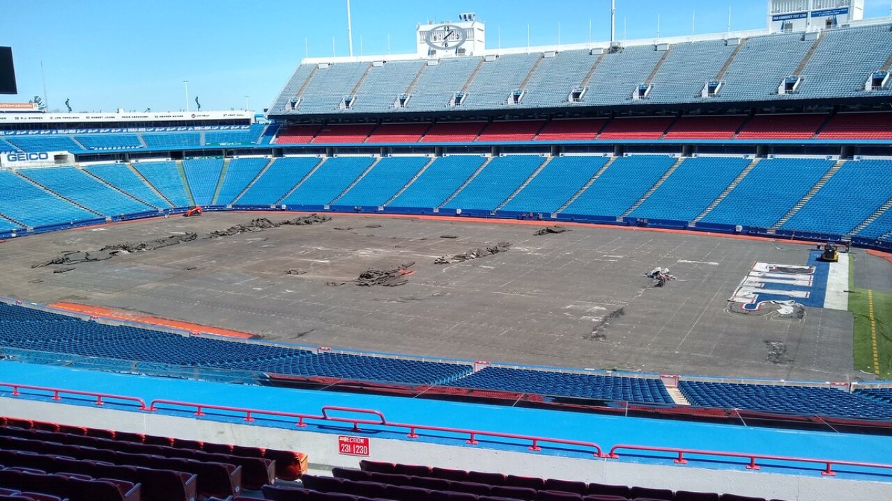 A sign of spring, New Era Field receiving new turf