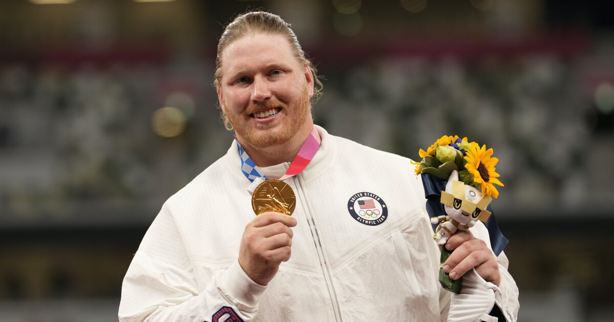US shot putter Crouser wins gold, breaks own Olympic record