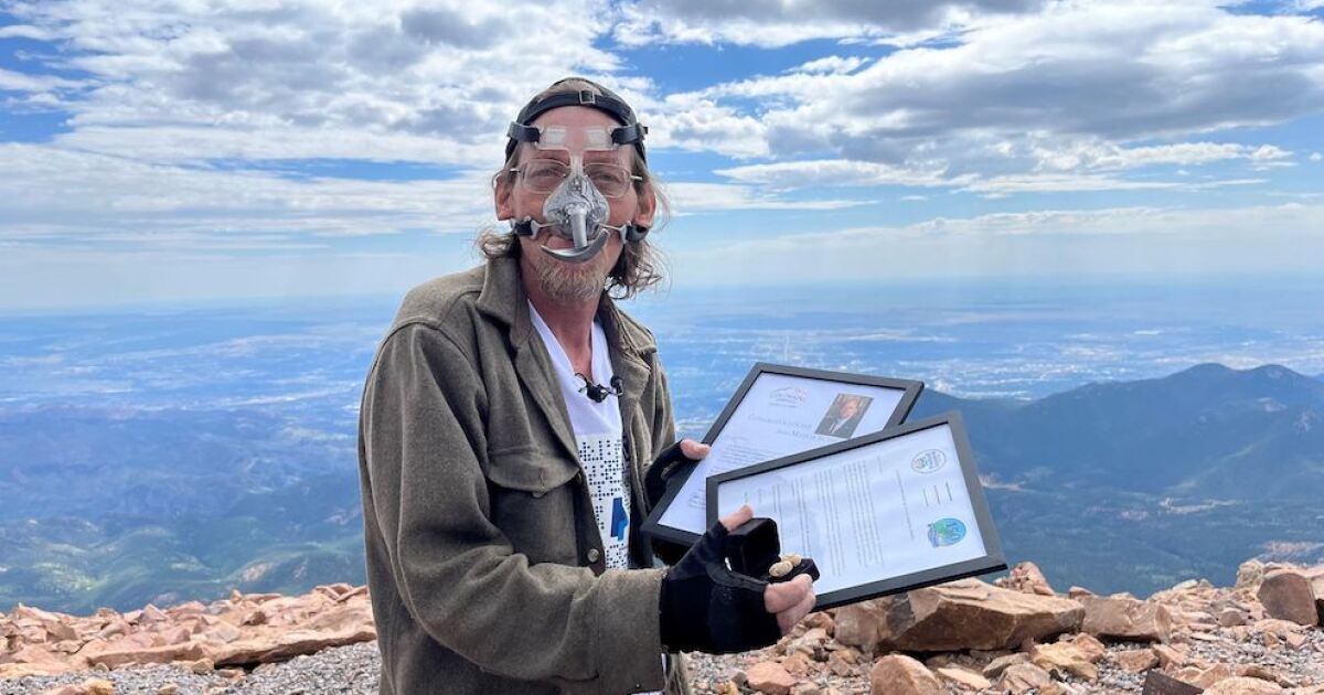 Colorado Springs man pushes peanut with his nose to Pikes Peak summit