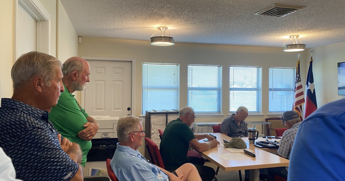 Island residents stand up to the PIPOA at Monday's meeting